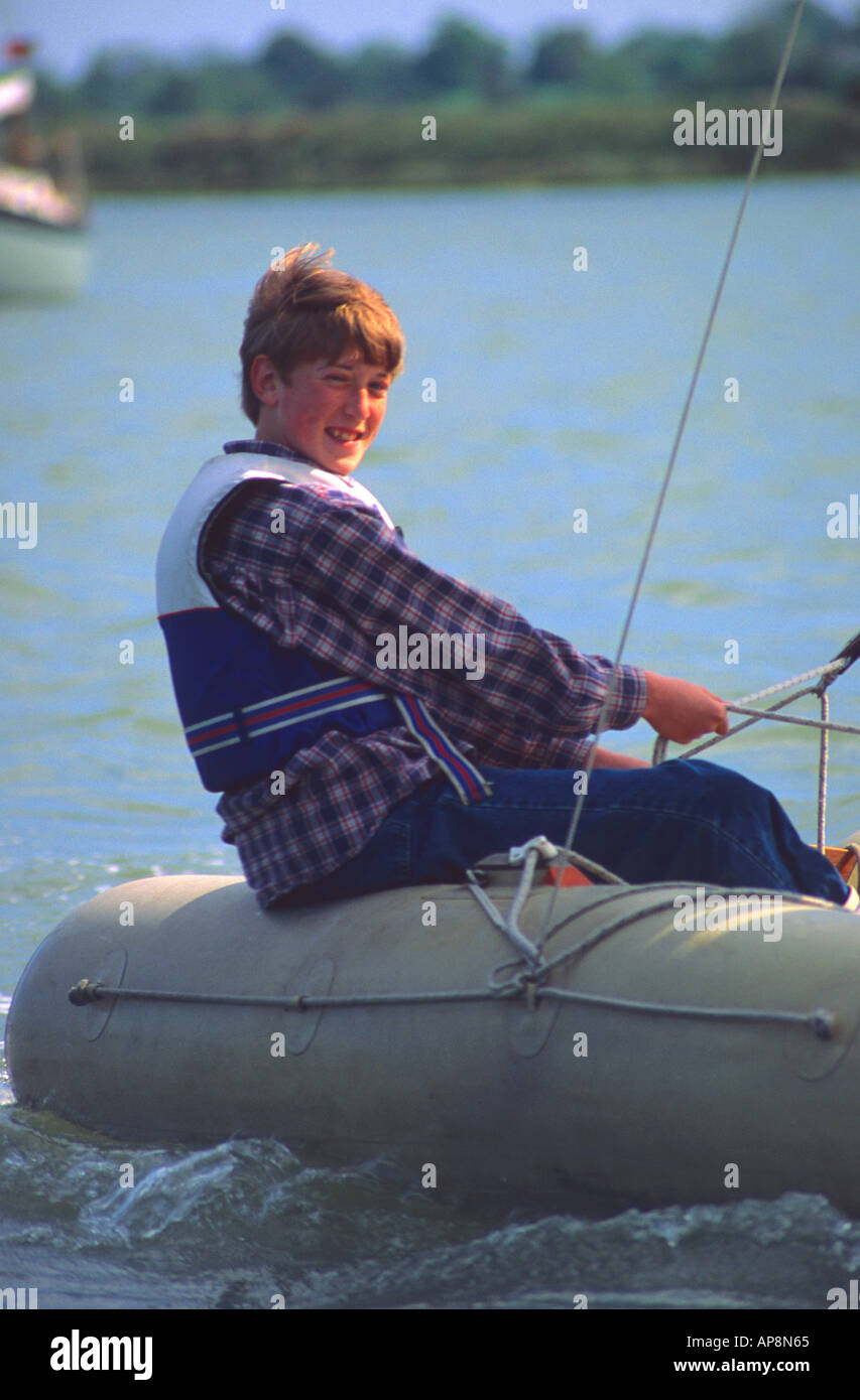 Young boy learning to sail Stock Photo - Alamy