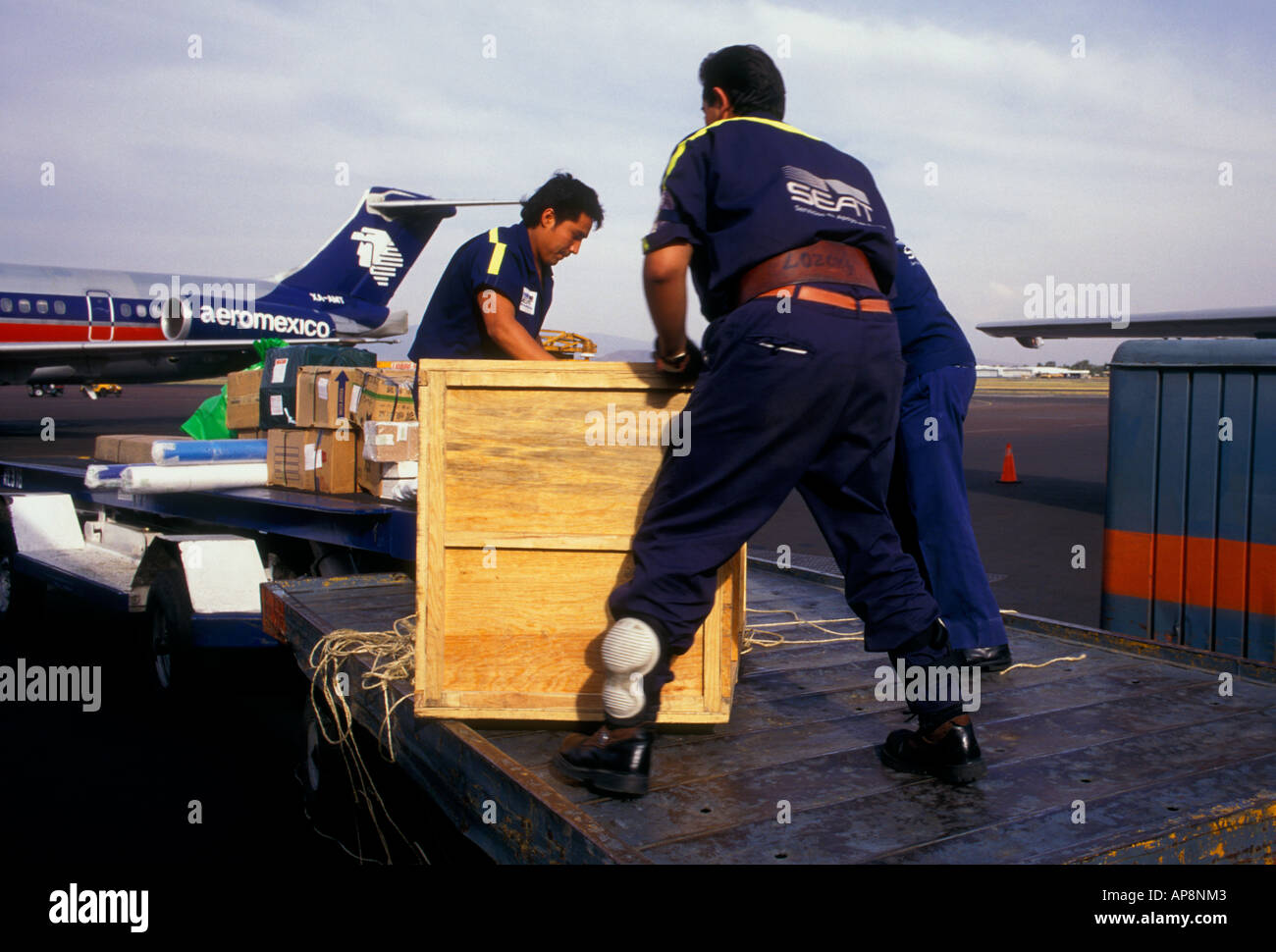 Mexican people person males men baggage handlers Benito Juarez ...