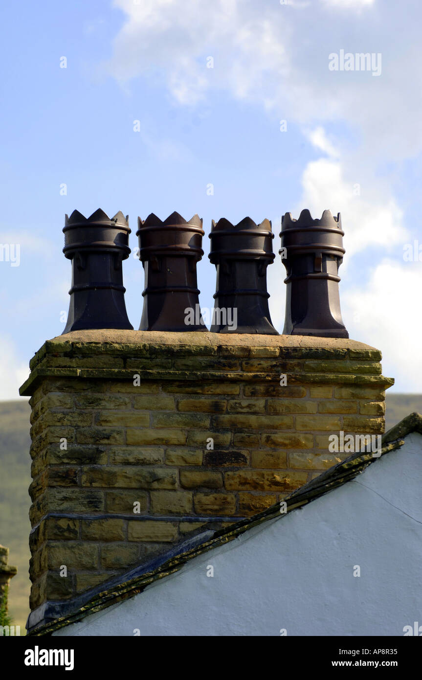 chimneys four stack roof rooftops Stock Photo - Alamy