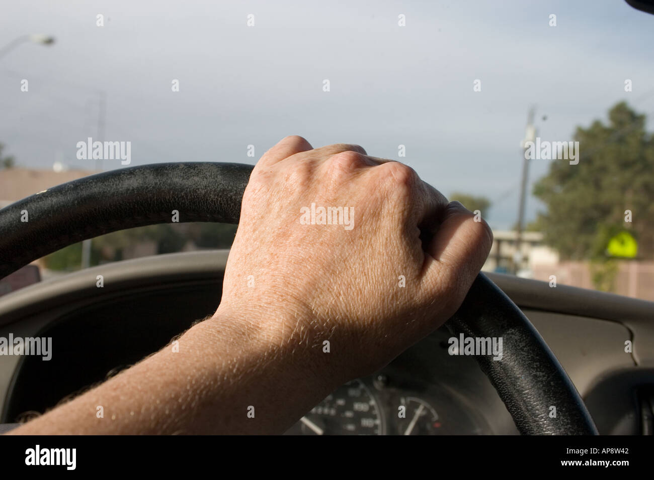 hand on steering wheel Stock Photo - Alamy