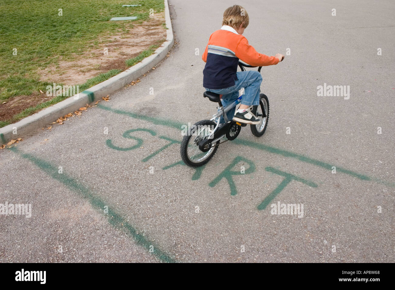 boy riding bike starting line Stock Photo - Alamy