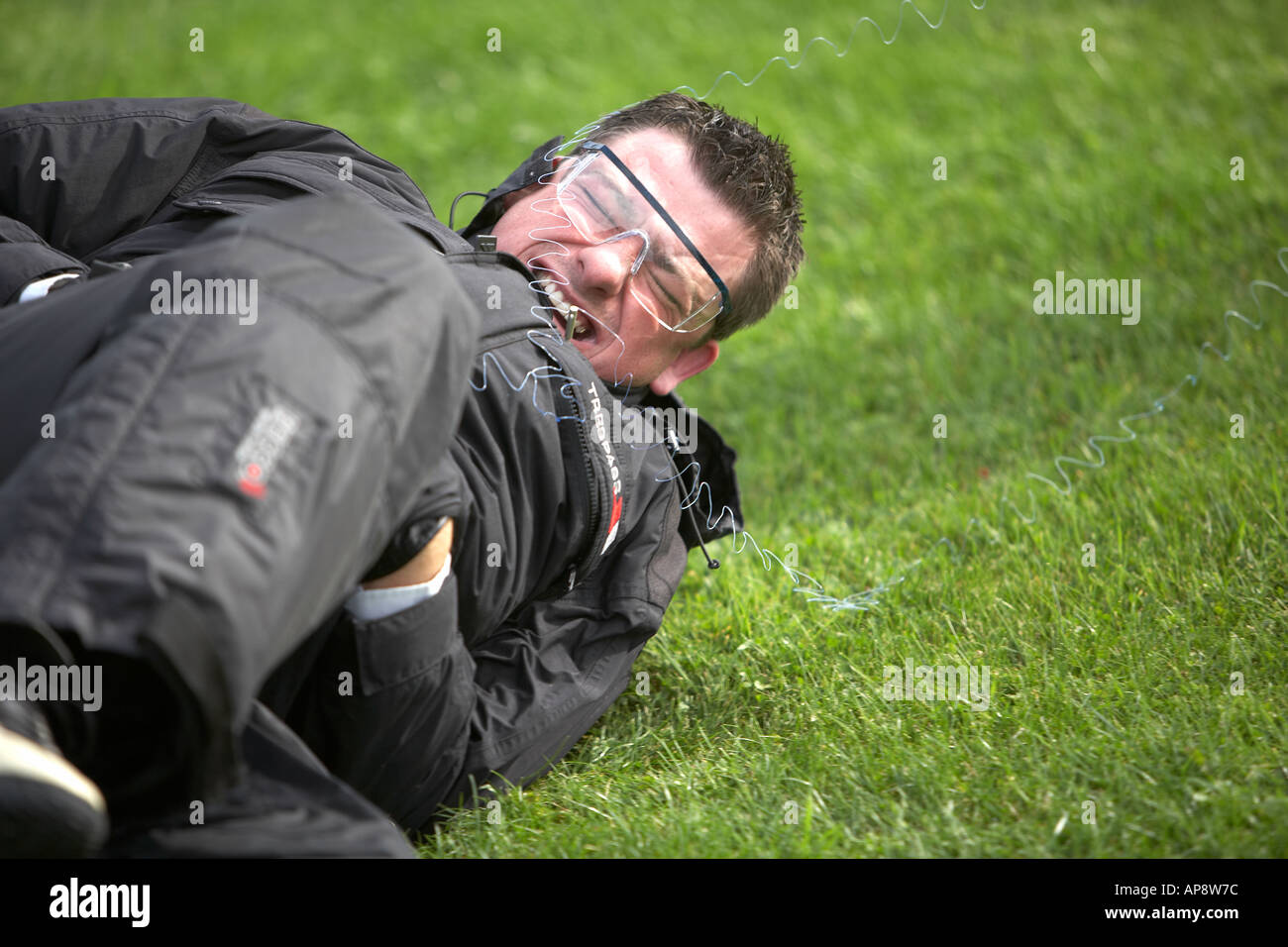 Humberside police firearms officer demonstrates the Taser gun. The X26 ...