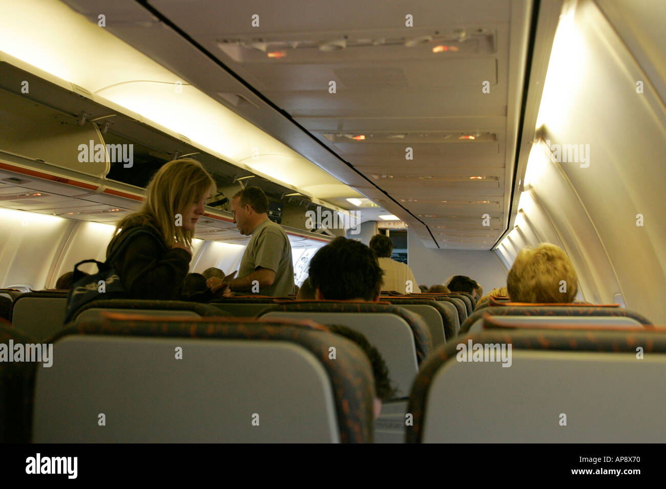 Passengers board an Easyjet Boeing 737 from Belfast International ...