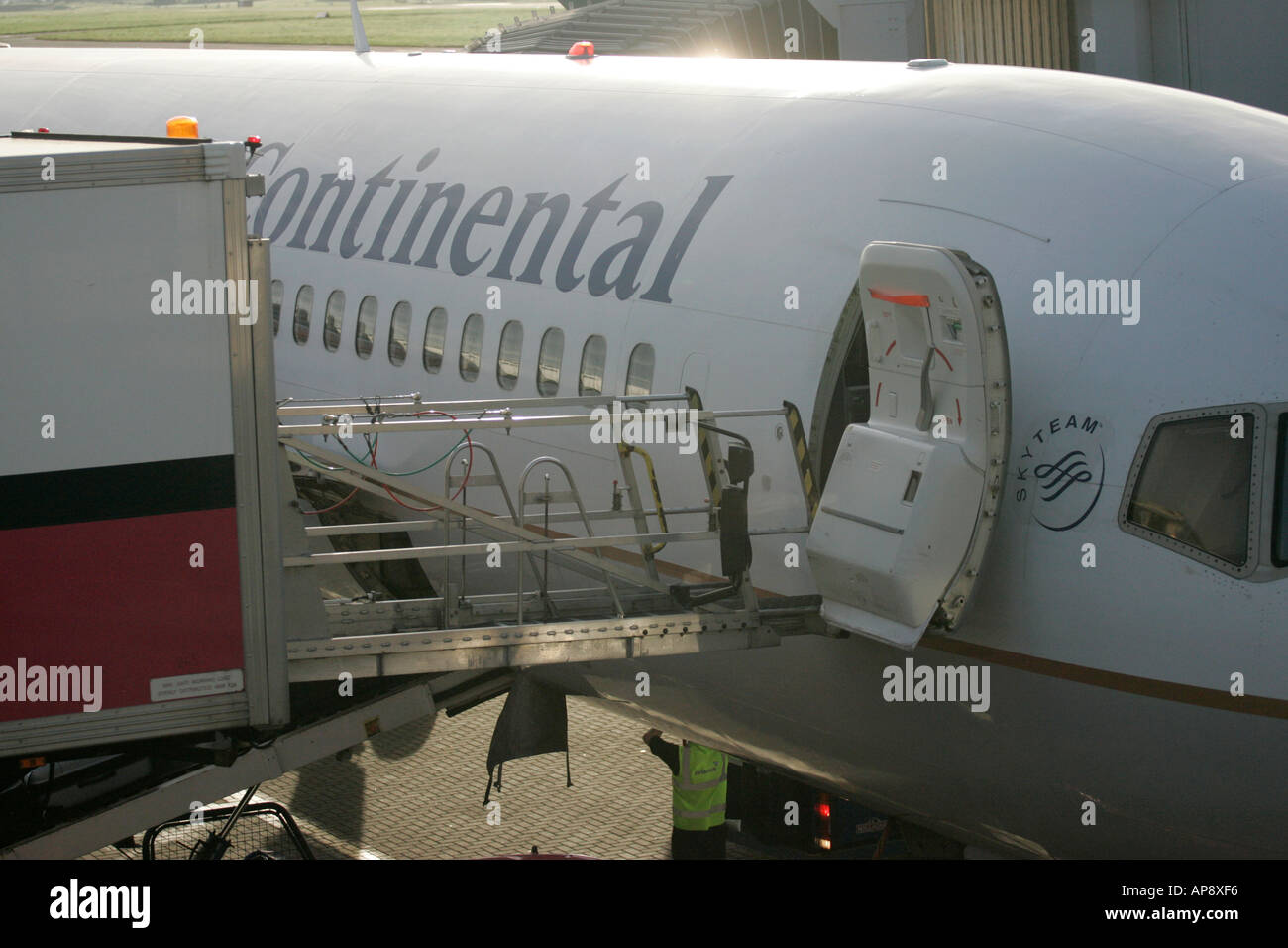 Continental jet being loaded with catering using special hydraulic lift ...