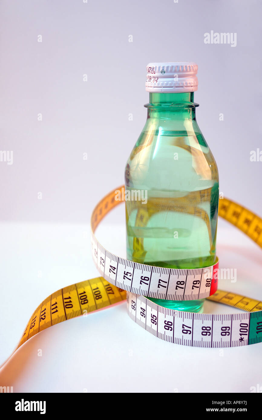 measuring tape with bottle Stock Photo - Alamy