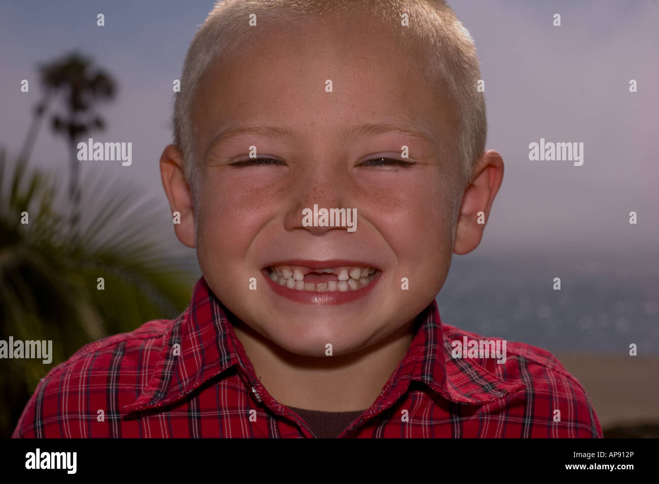 Boy missing two front teeth hi-res stock photography and images - Alamy