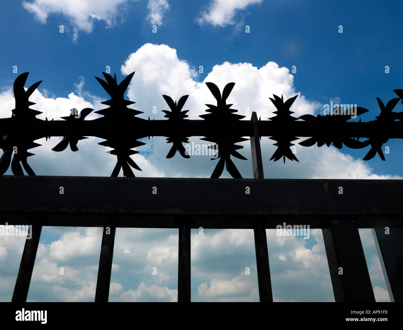 Barbed Wire on Security Gate Stock Photo - Alamy