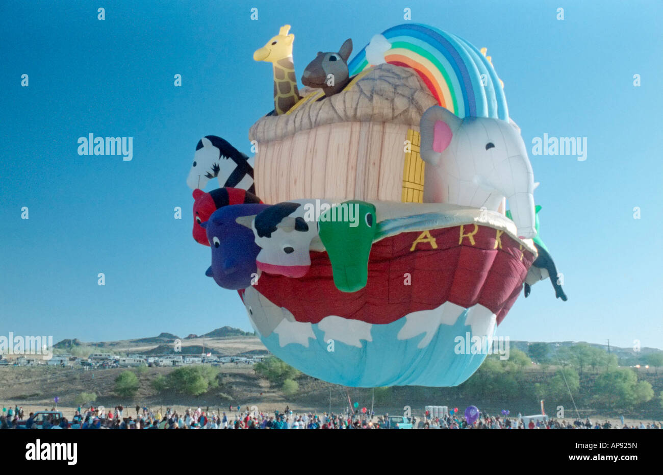 hot air balloon in a blue sky caricature of "noah's ark Stock Photo - Alamy