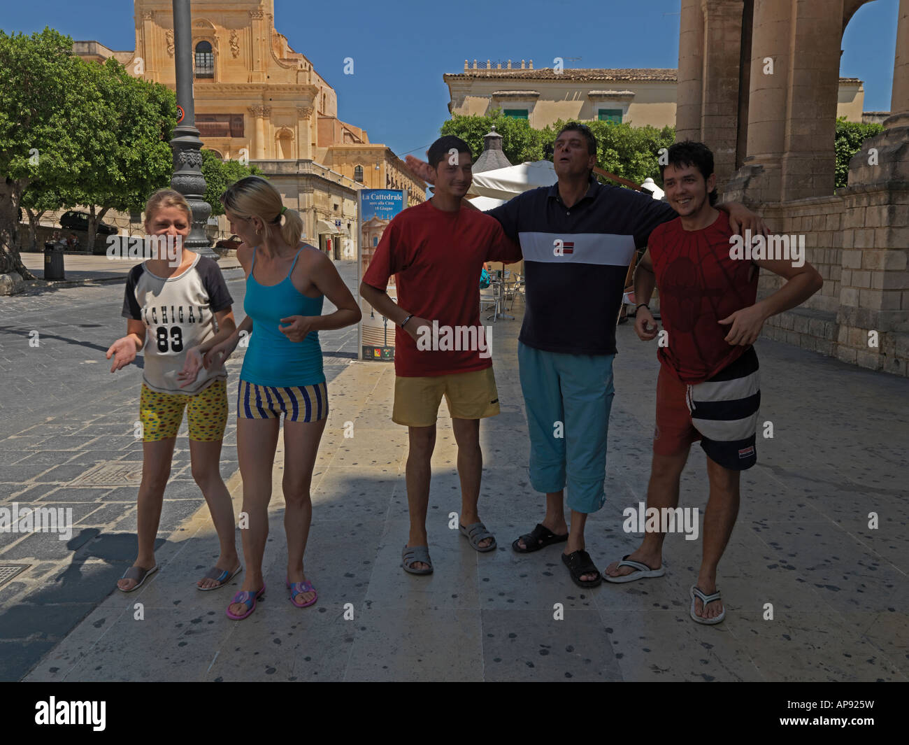 Group of Deaf Tourists Signing Noto Sicily Italy Stock Photo - Alamy