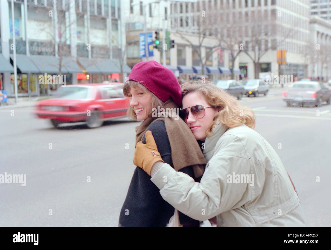 Two ladies hug hi-res stock photography and images - Alamy