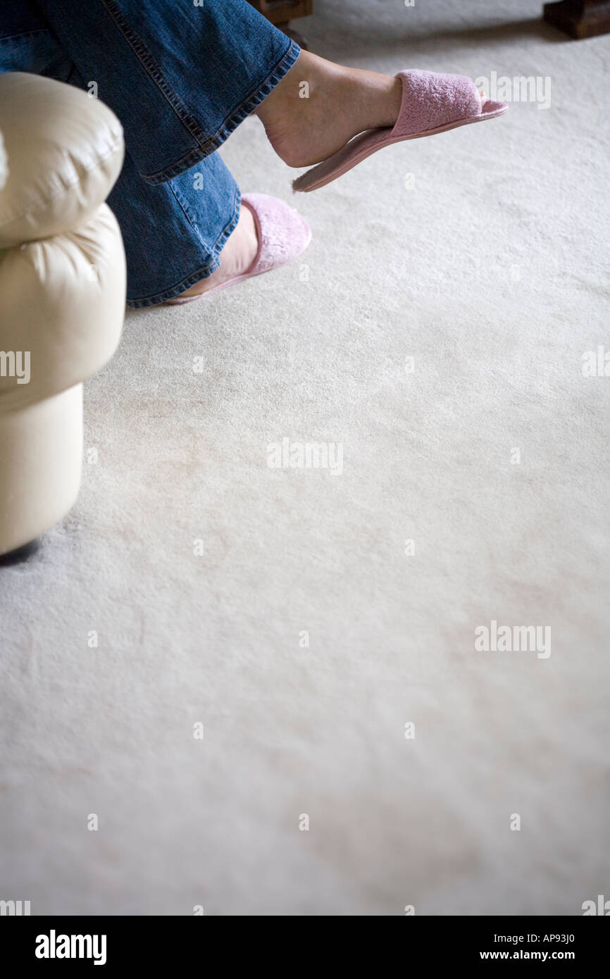 female feet wearing slippers Stock Photo - Alamy