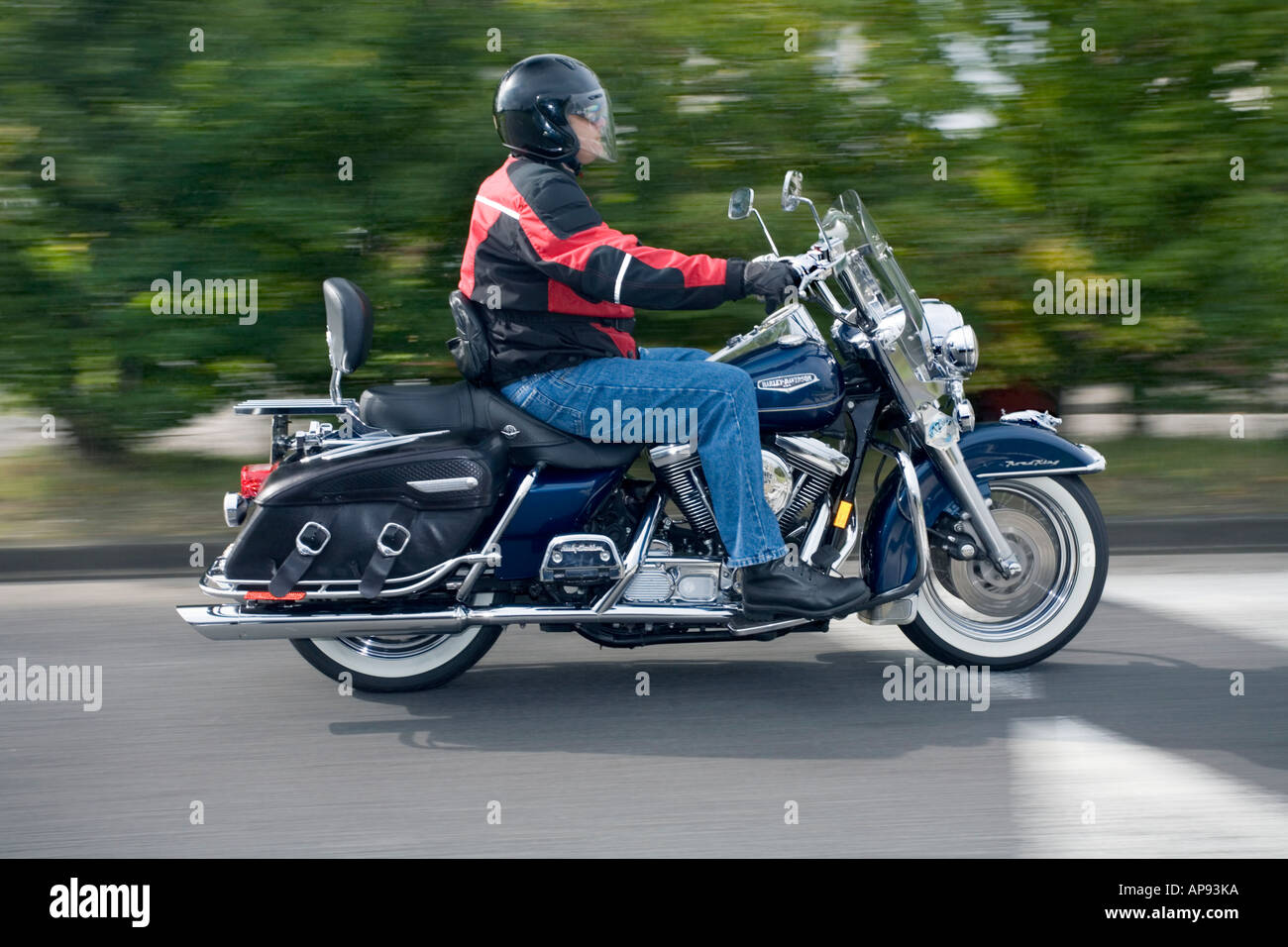 MIDDLE AGED MAN RIDING A HARLEY DAVIDSON MOTORBIKE Stock Photo - Alamy