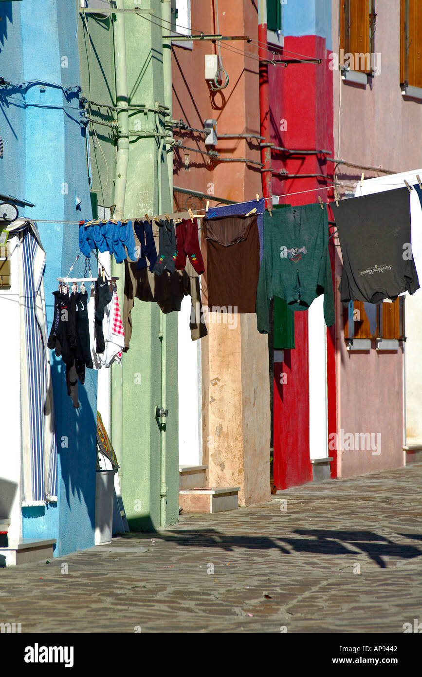 Laundry hanging on a washing line on the Venetian island of Burano ...