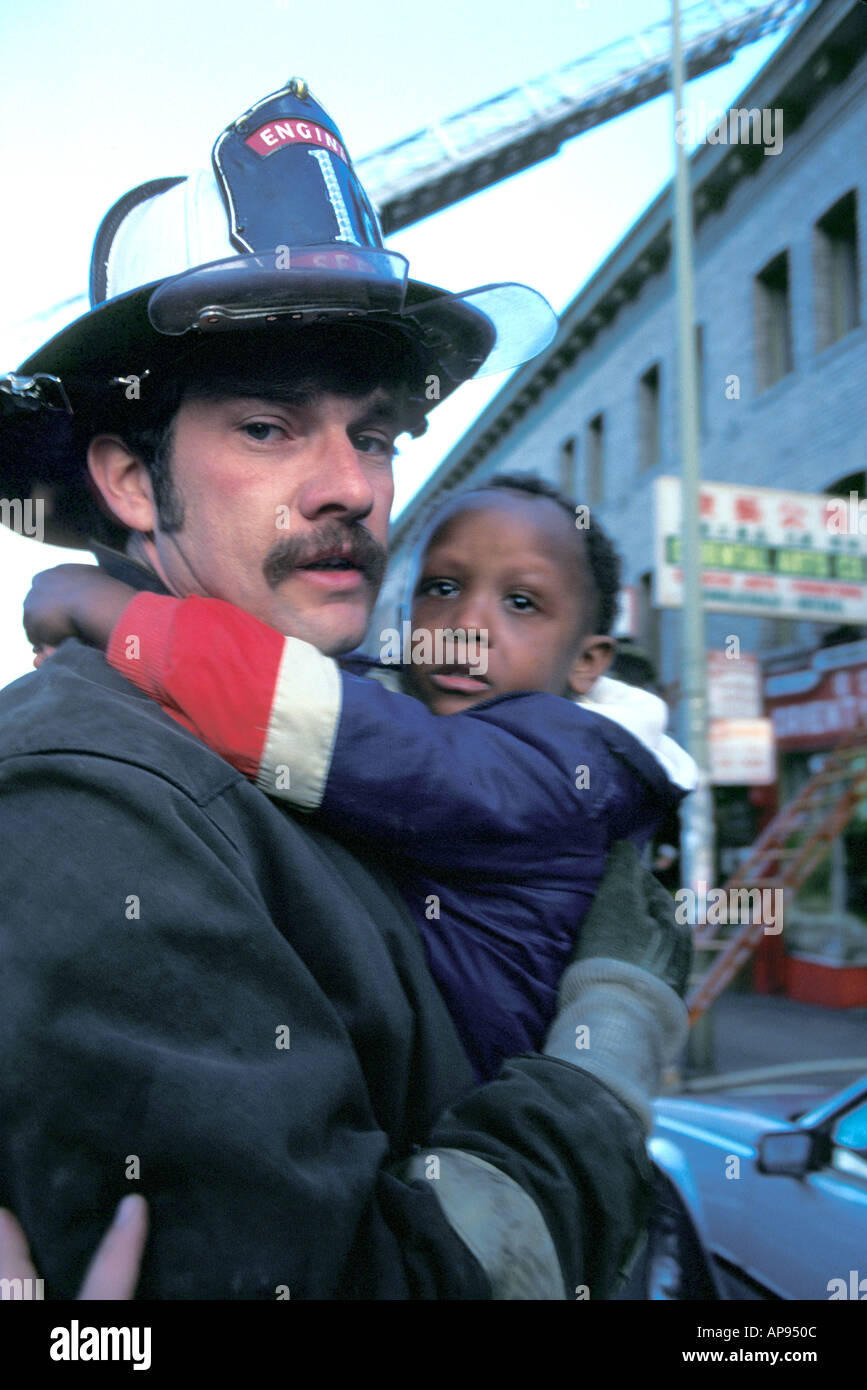 Fireman rescue child hi-res stock photography and images - Alamy