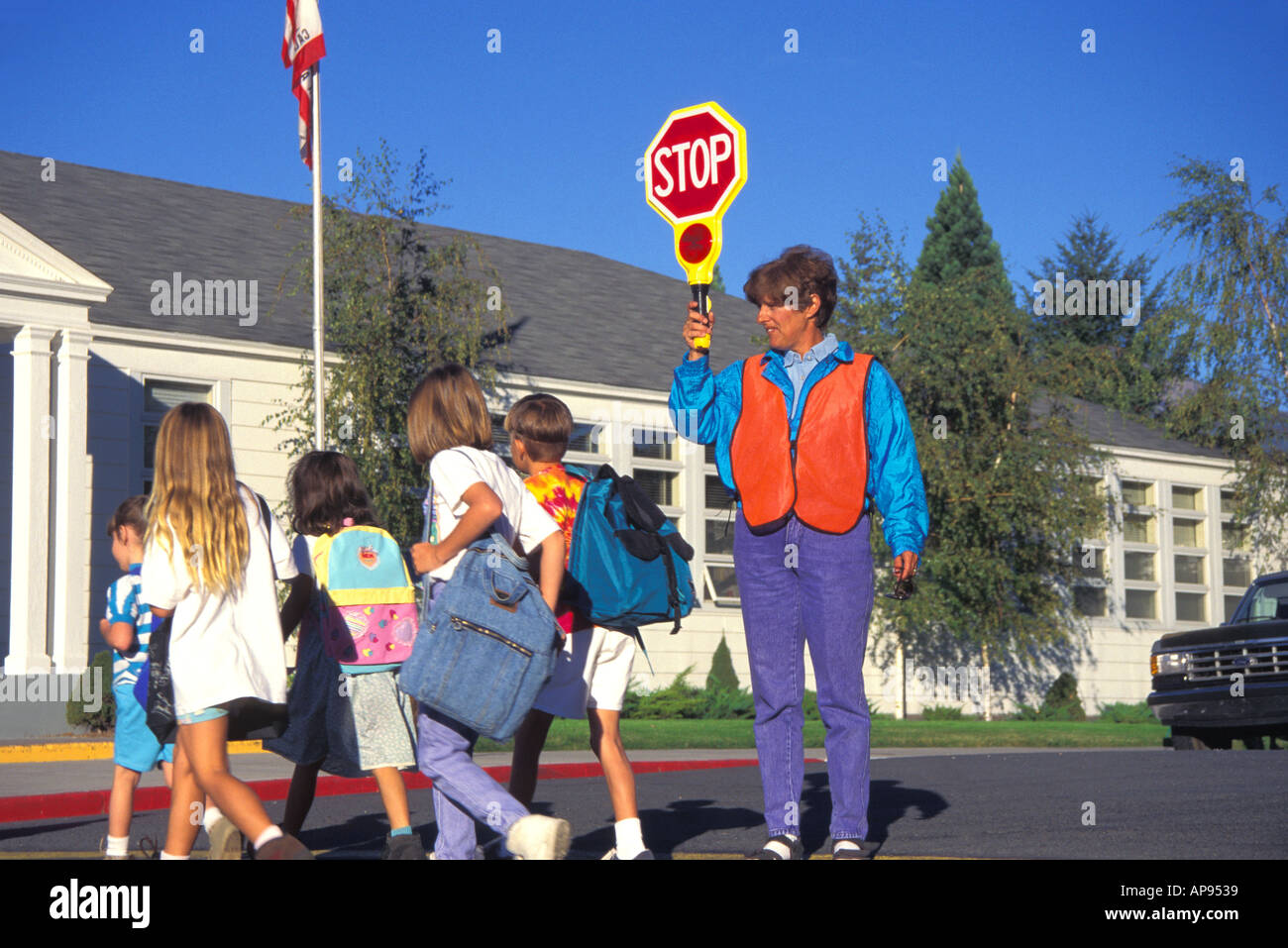 Crossing Guard Stop Sign Holding High Resolution Stock Photography and ...