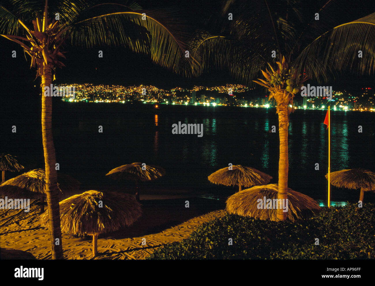 Beachfront at night Stock Photo - Alamy