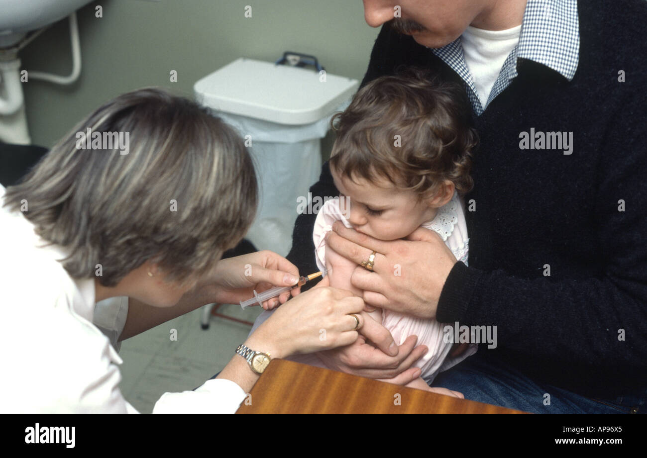 triple injection vaccination for four month baby MMR Stock Photo - Alamy