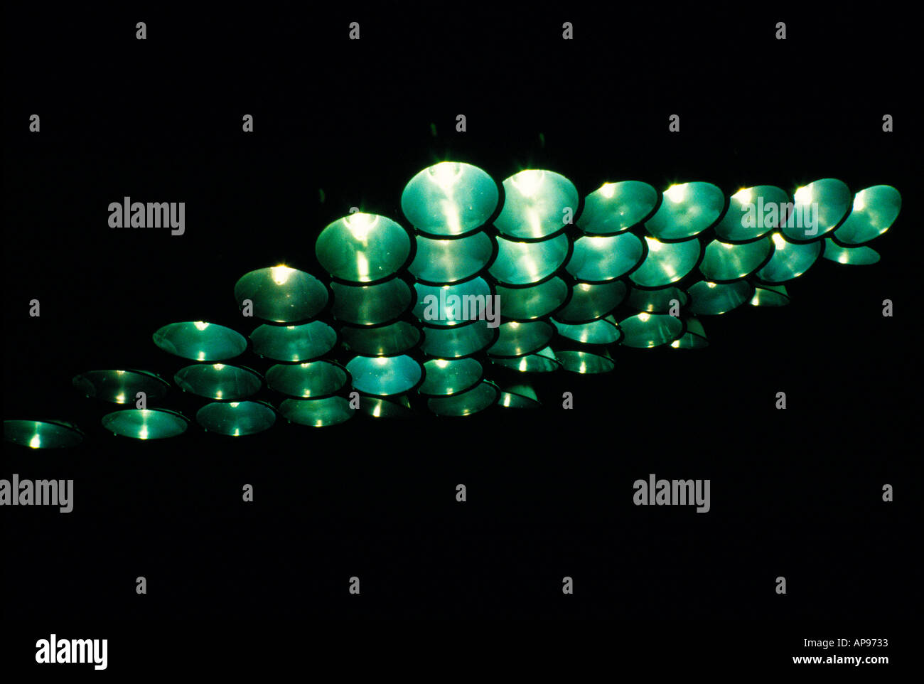 a collection of flood lights against the night sky Stock Photo - Alamy