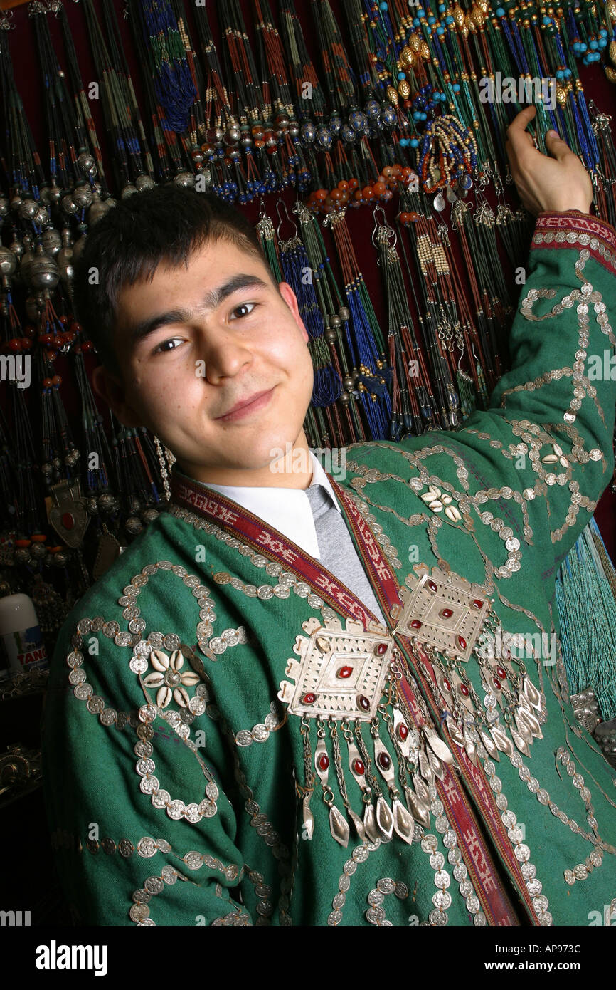 Young man named Allahverdi working in family owned Turkmen souvenir ...