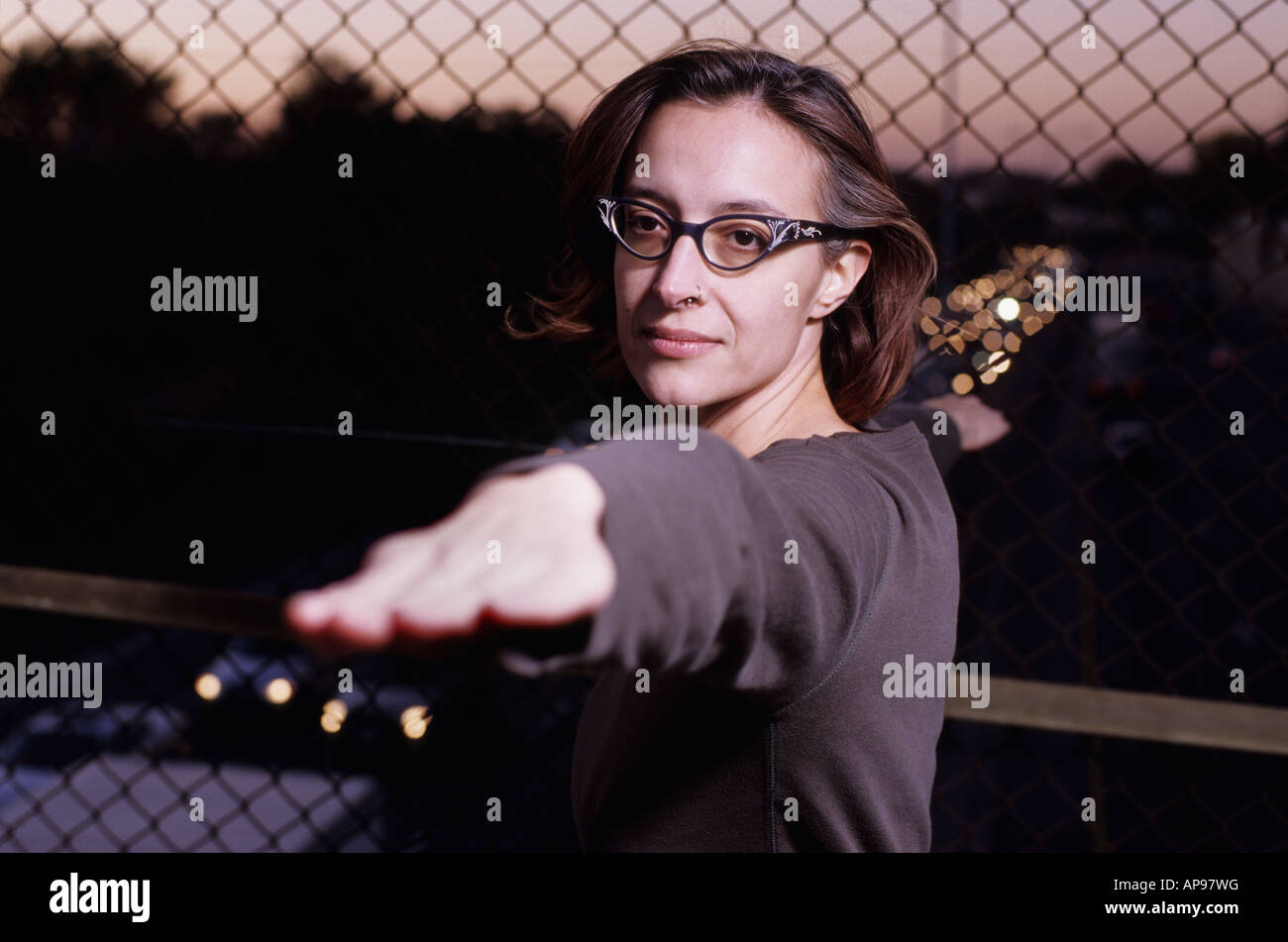 Woman doing yoga on a freeway overpass Stock Photo - Alamy
