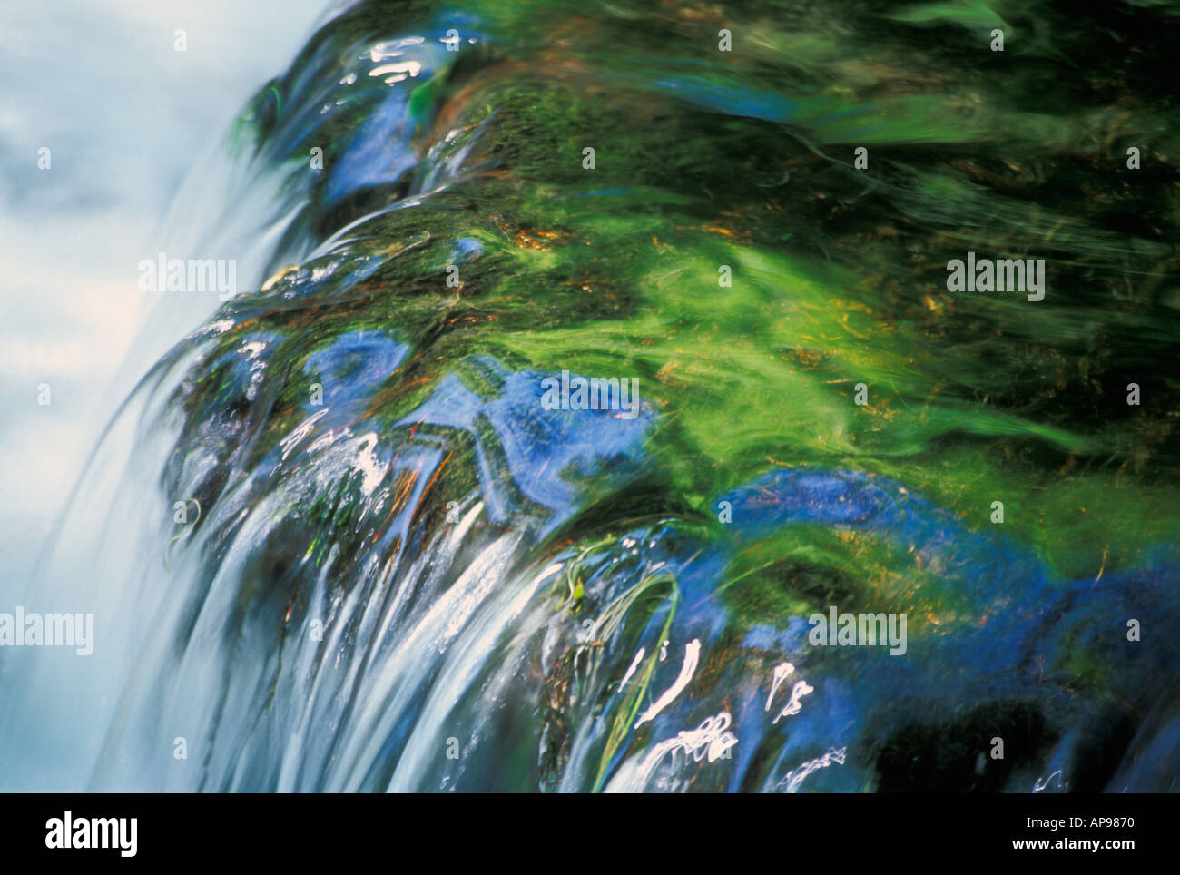 The River Dove Dovedale flowing over a small waterfall Derbyshire Peak ...
