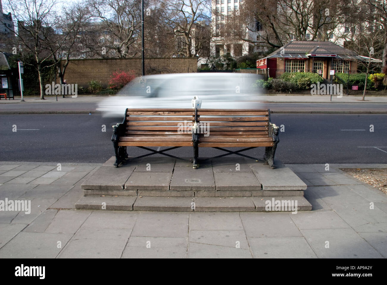 Van speeds past bench at Embankment, Charring Cross, London Stock Photo ...
