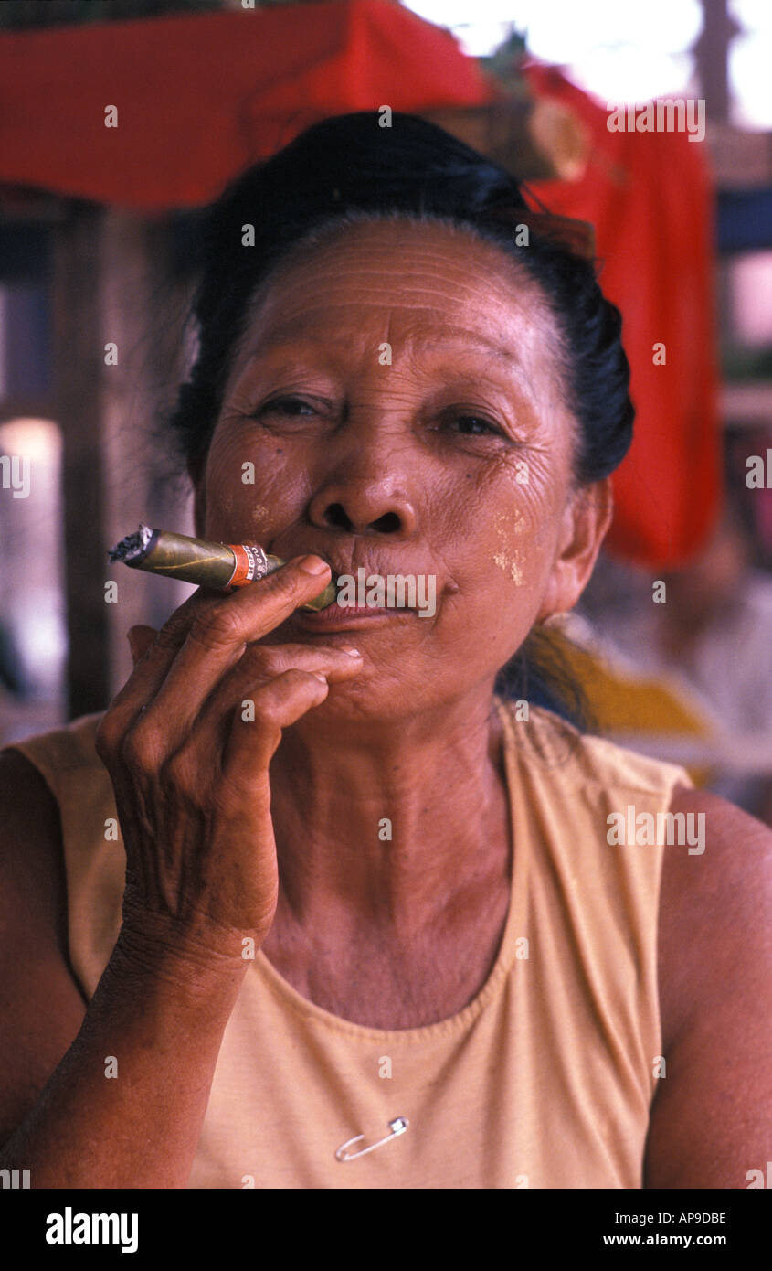 Woman smoking a cheroot cigar hi-res stock photography and images - Alamy