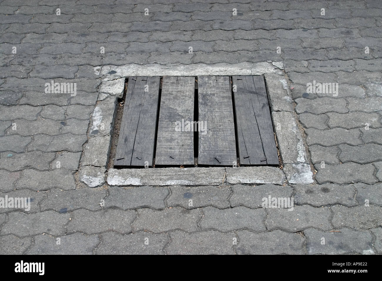 Wooden manhole cover hi-res stock photography and images - Alamy