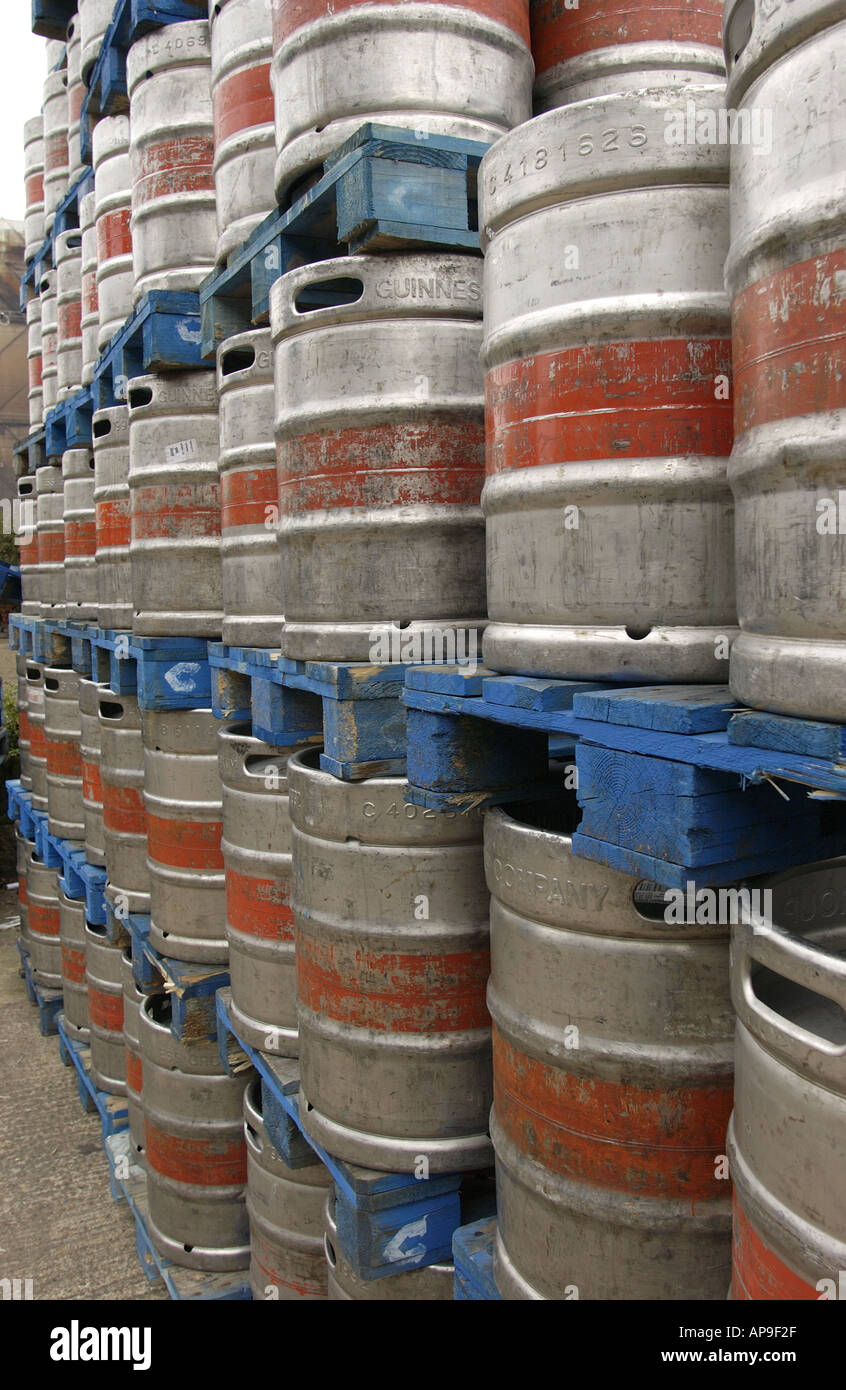 steel Beer barrels stacked on pallets at Youngs Brewery in South west ...