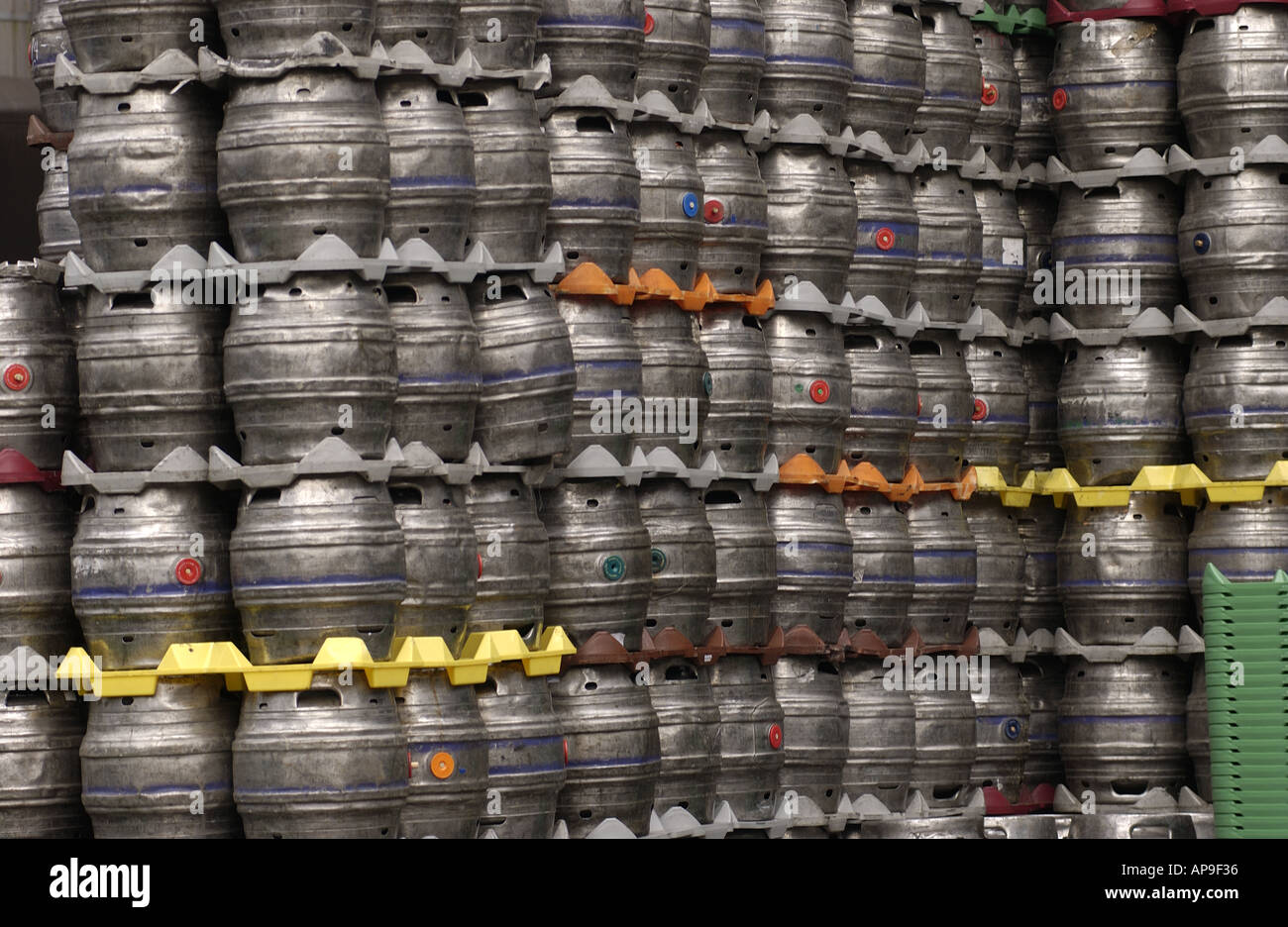 steel Beer barrels stacked on pallets at Youngs Brewery in South west ...