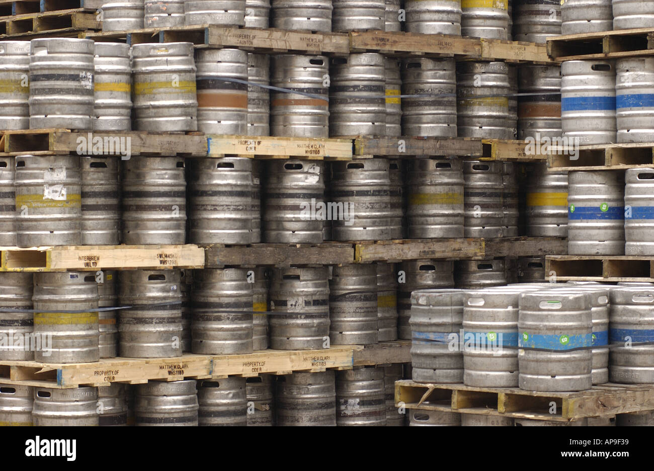 steel Beer barrels stacked on pallets at Youngs Brewery in South west ...