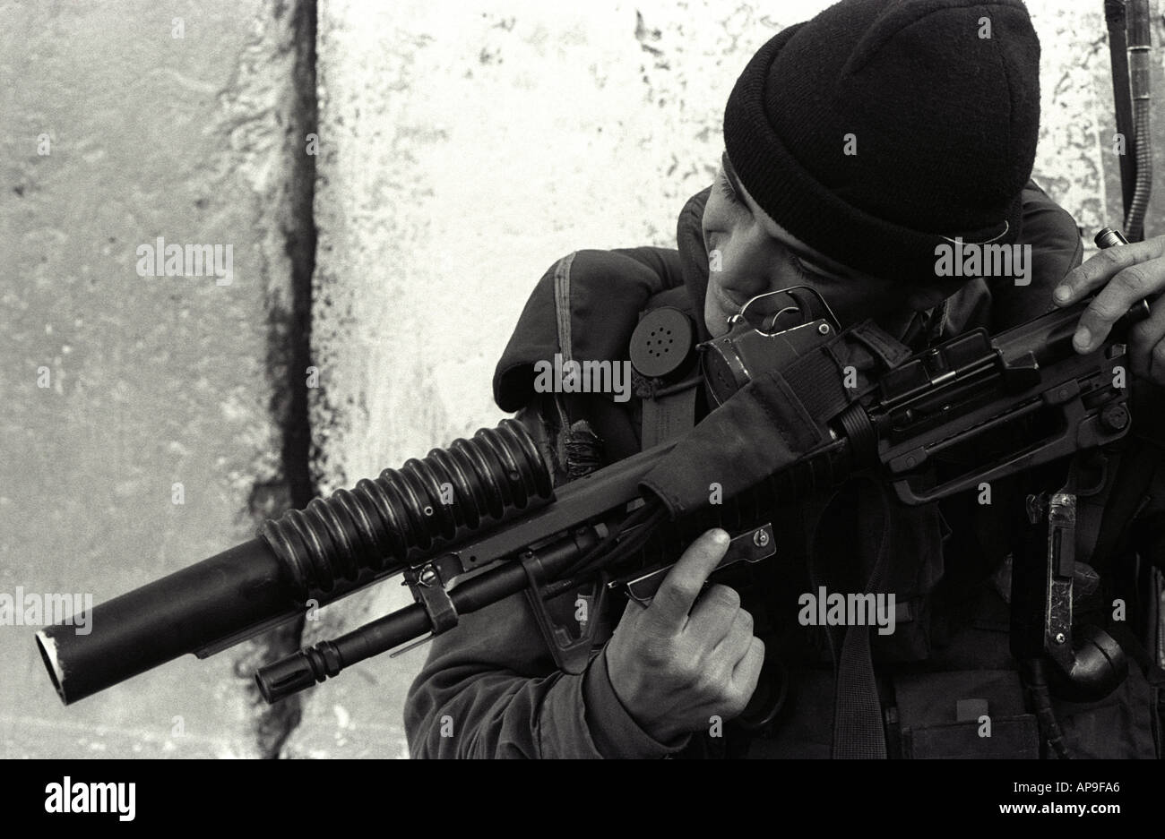 IDF soldier undertaking weapons check prior to patrolling streets of ...