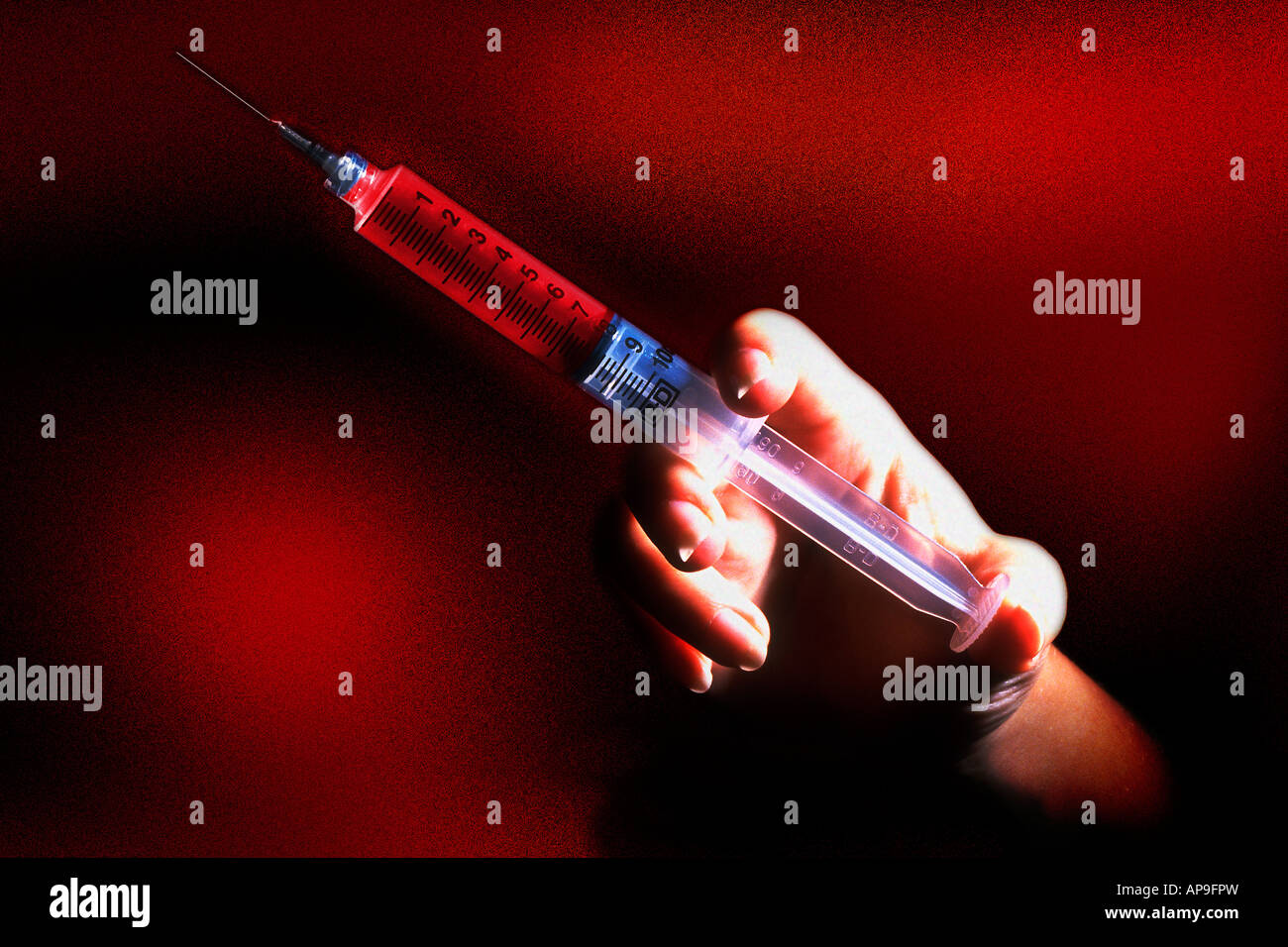 Human hand with syringe, concept, studio shot Stock Photo - Alamy