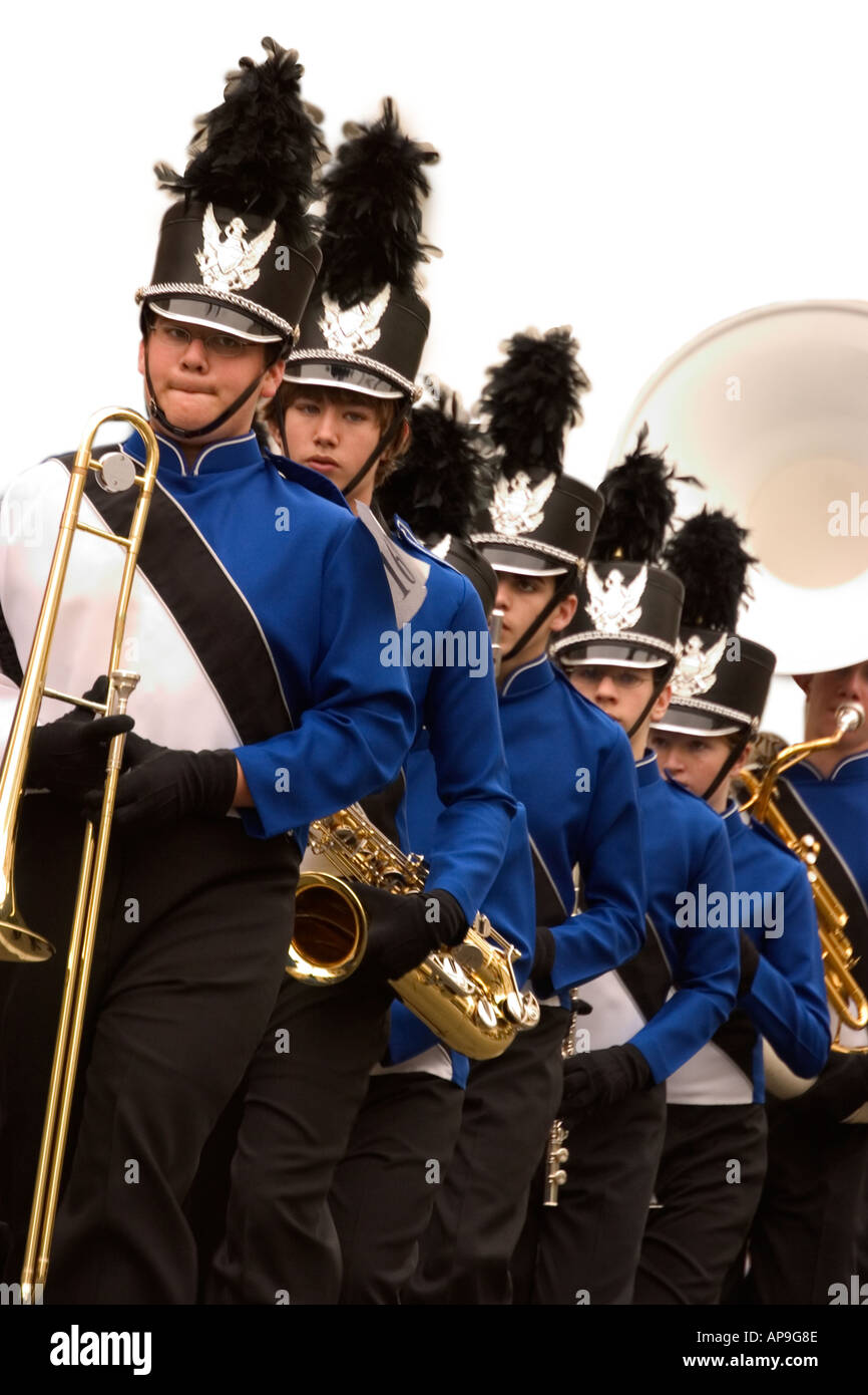 A school marching band performs at a parade Stock Photo - Alamy