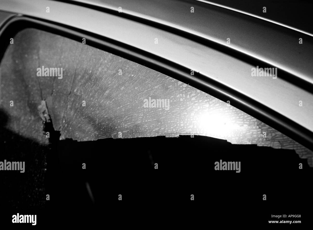 Car crime smashed window Black and White Stock Photos & Images - Alamy