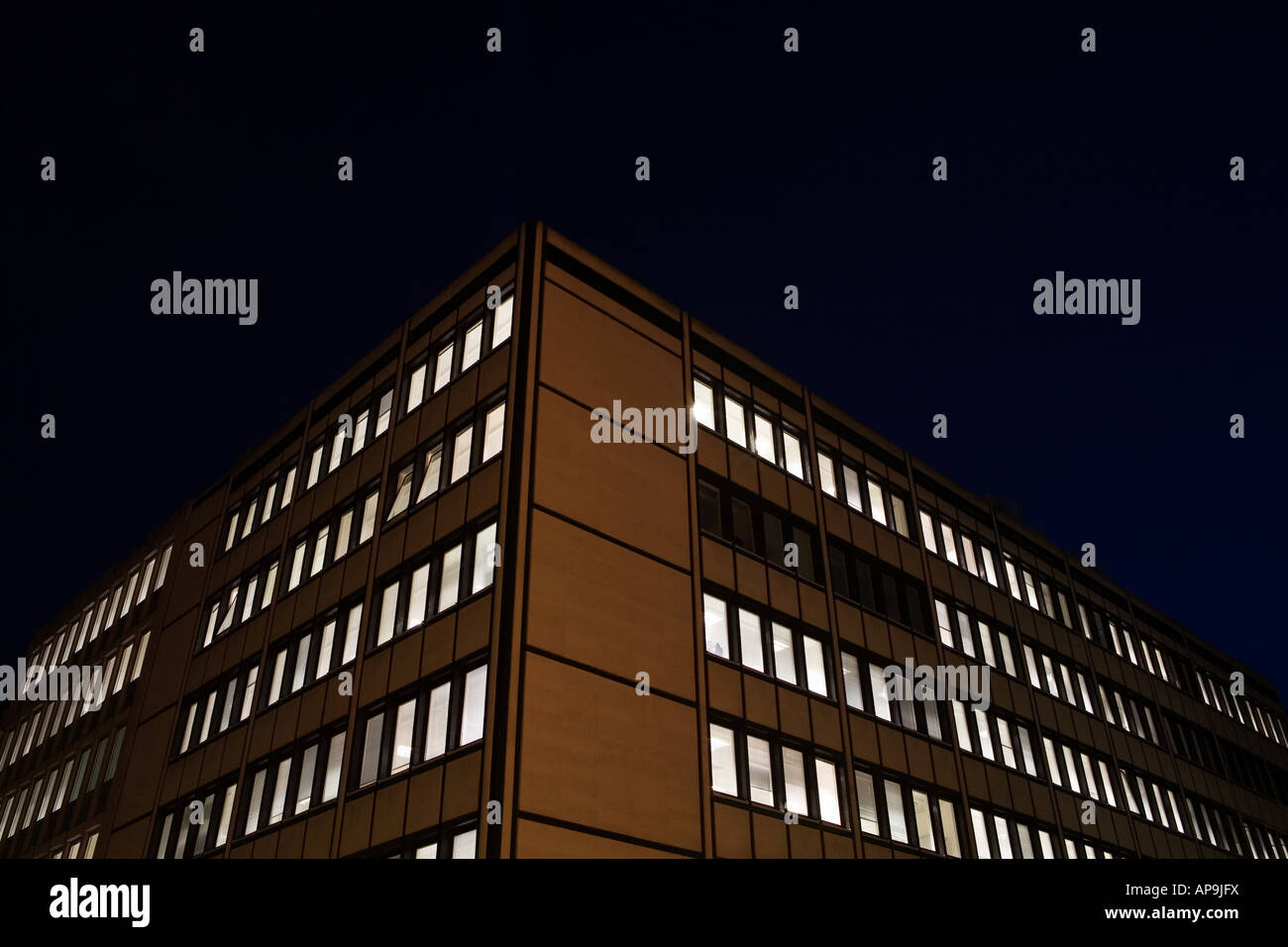 Office building at night Stock Photo - Alamy