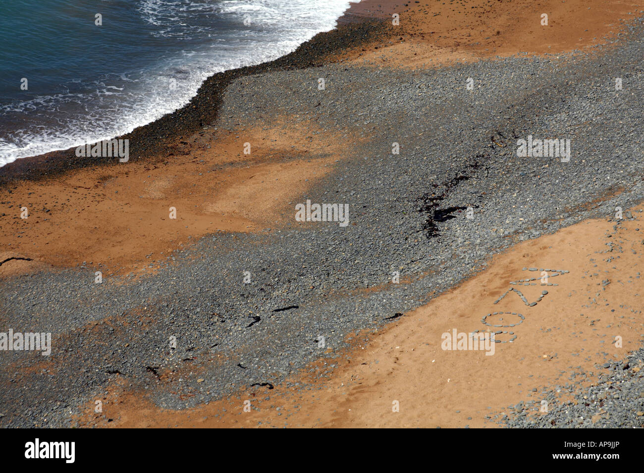NZ08 – pebbles in the sand at Bushy Beach, Oamaru, South Island, New ...