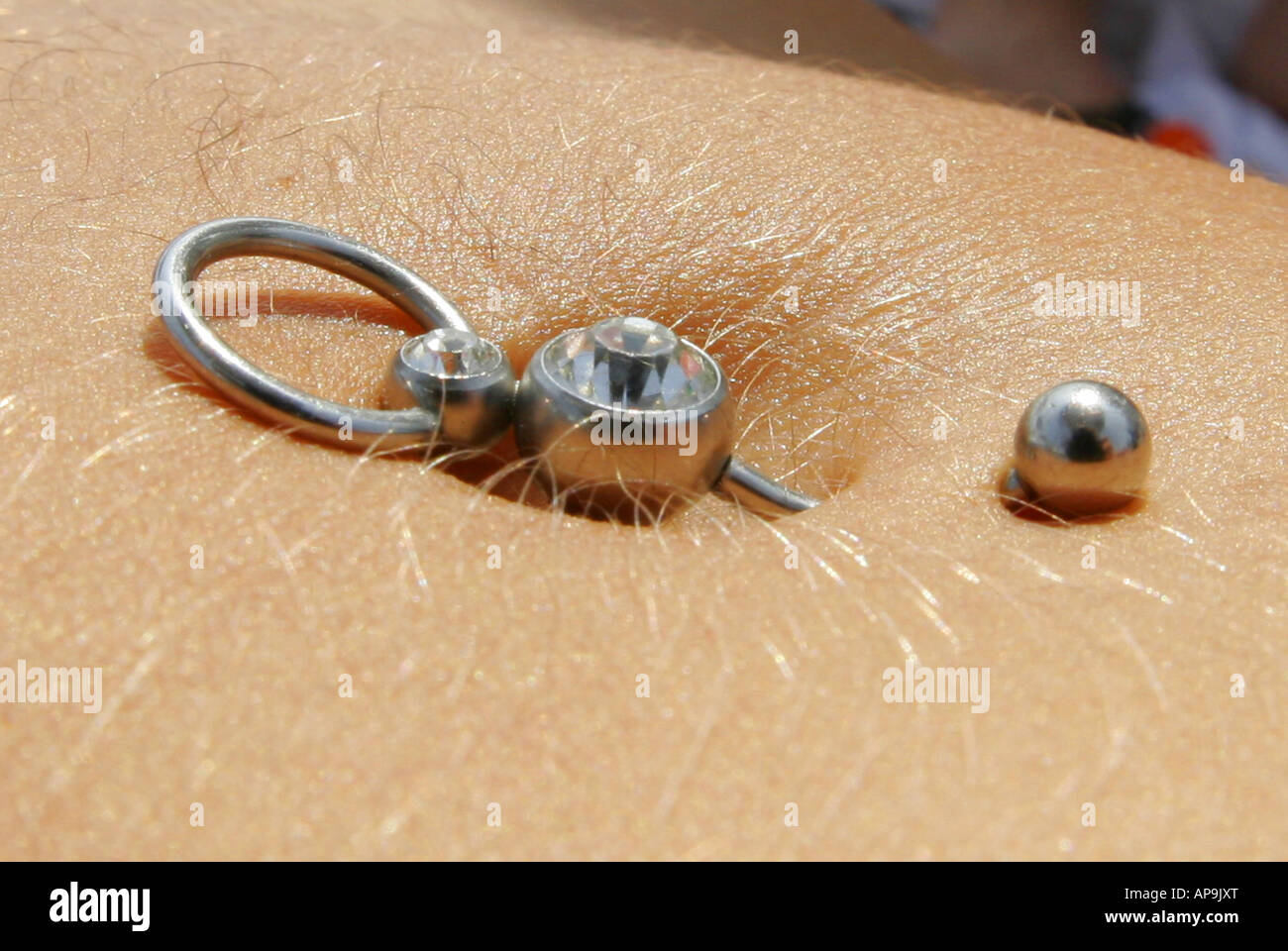 Belly button piercing hi-res stock photography and images - Alamy