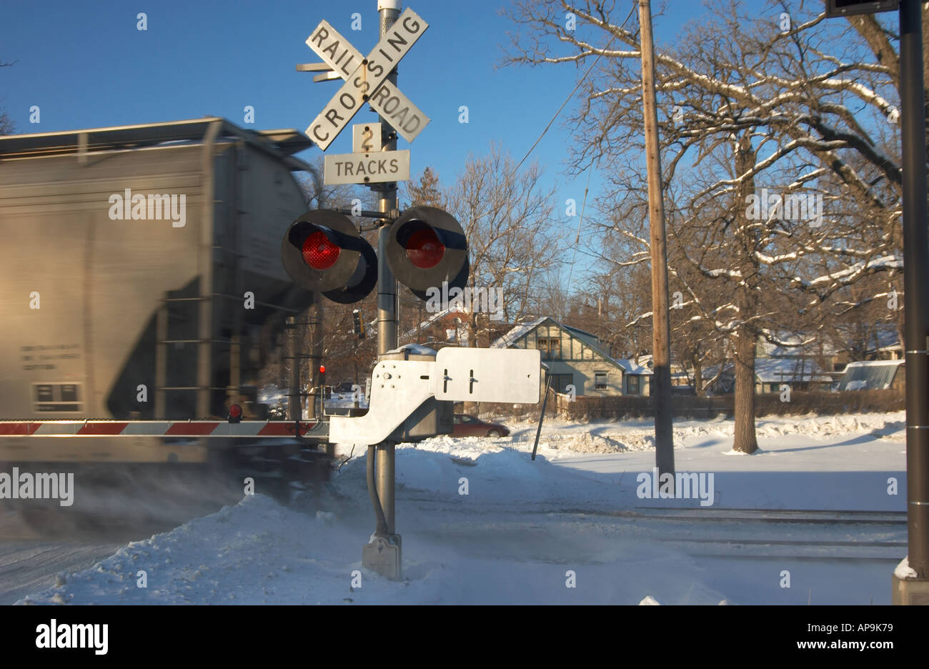 Rail road crossing on a snowy and cold day Stock Photo - Alamy