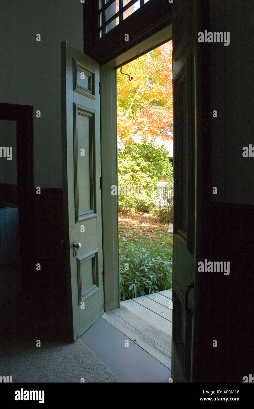 Open door at front of house Stock Photo - Alamy