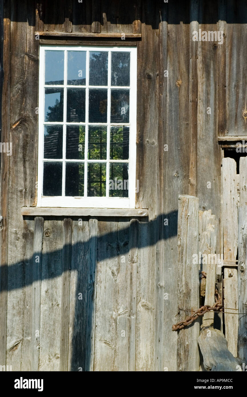 Multi pane window in old wooden barn Stock Photo - Alamy