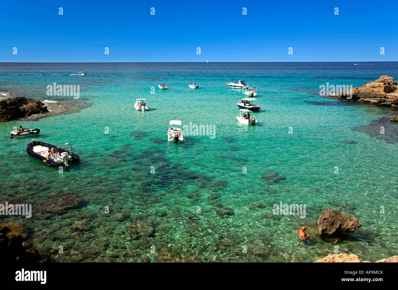 Boats and people swimming at Cala Vella. Mallorca Island. Spain Stock ...