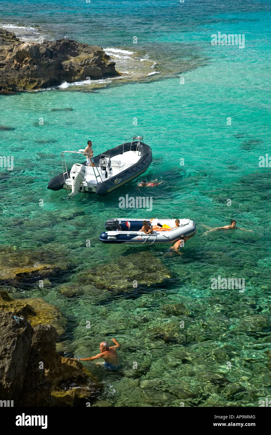 Boats and people swimming at Cala Vella. Mallorca Island. Spain Stock ...