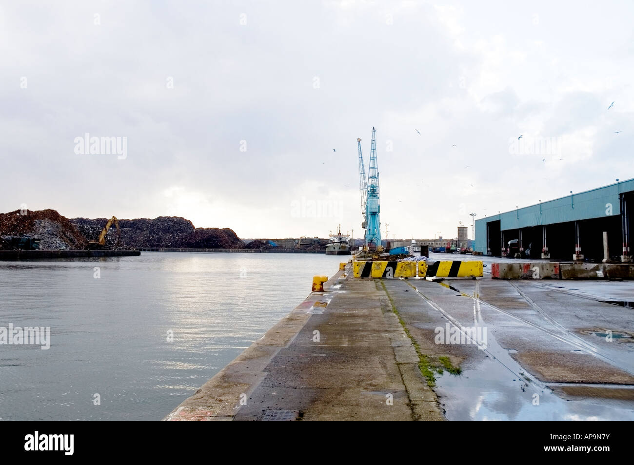 Mersey docks with crane and warehouse Stock Photo - Alamy