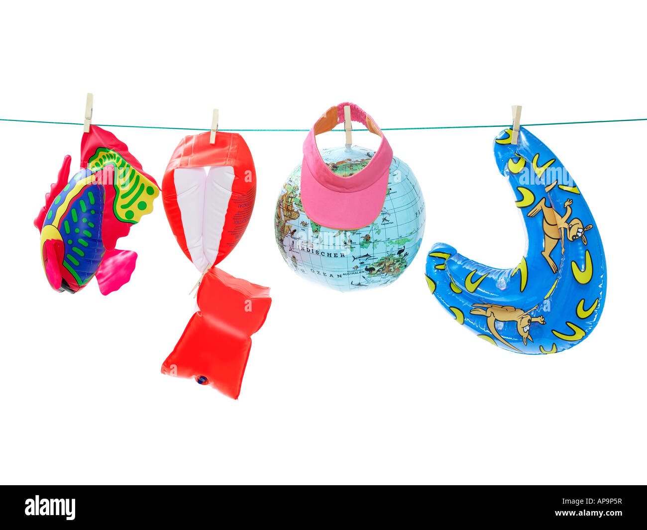 Inflatable toys on washing line Stock Photo - Alamy