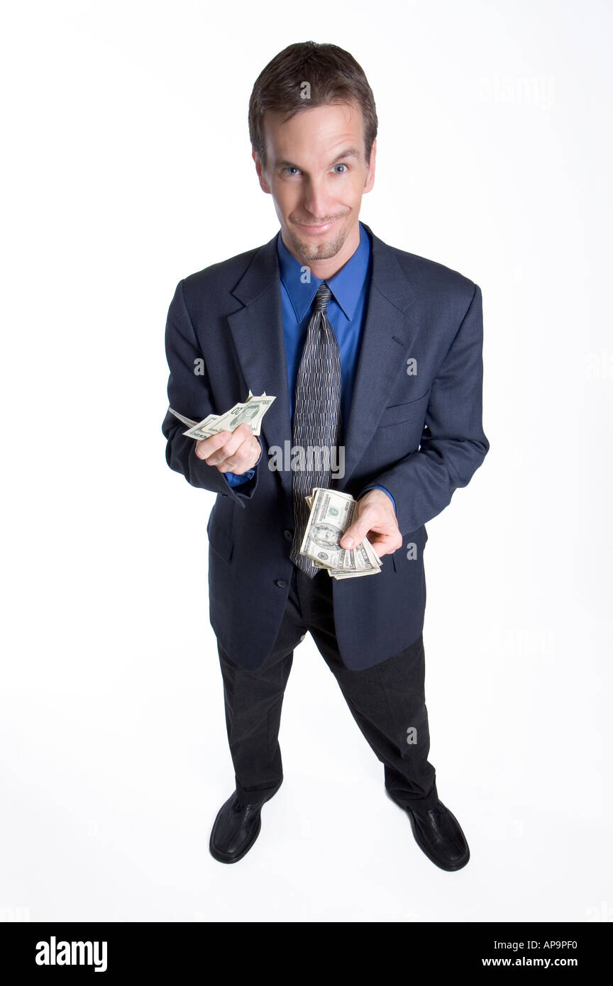 Man counting money rich suit Cut Out Stock Images & Pictures - Alamy