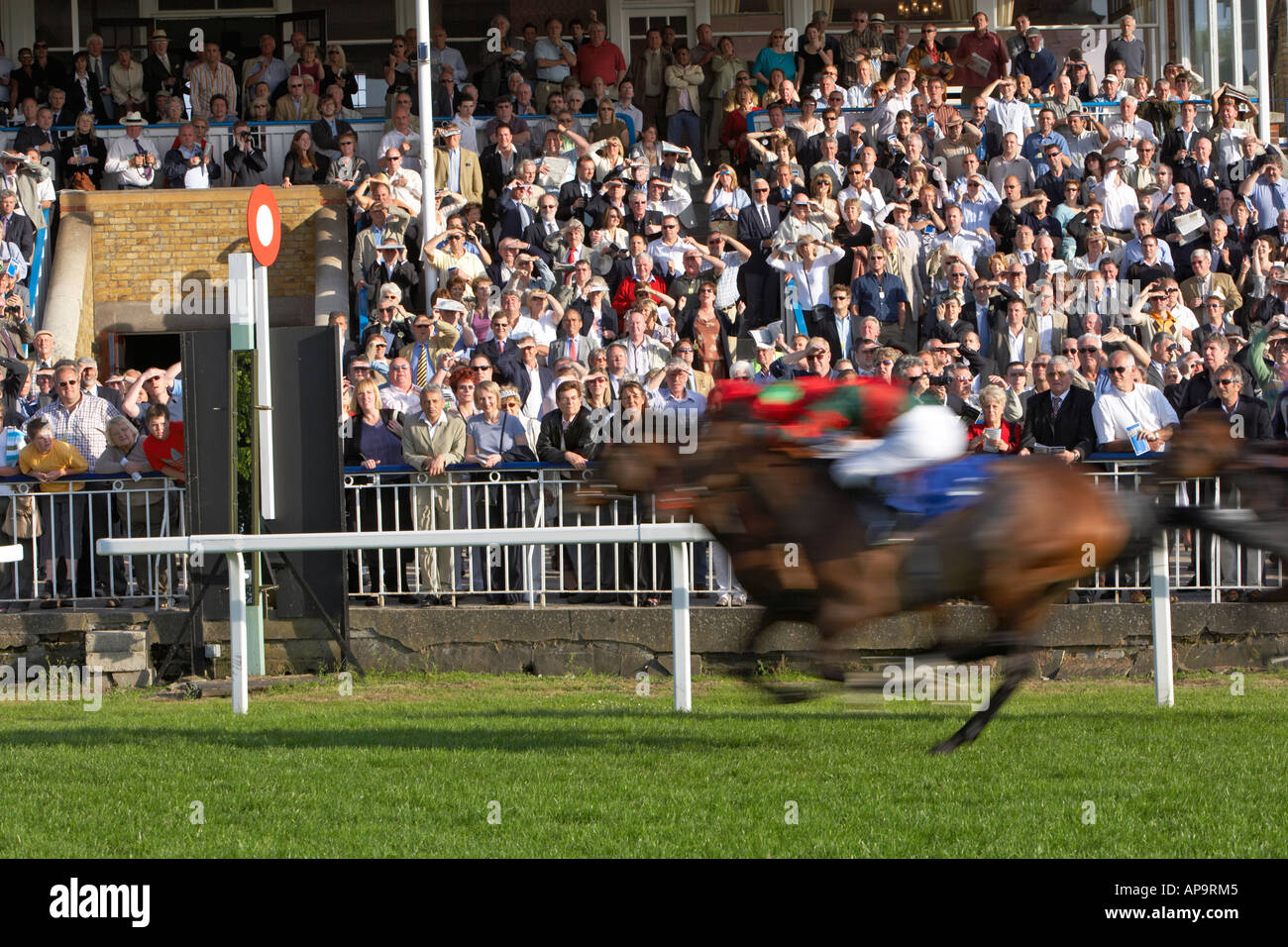 racehorses crossing the winning line at Windsor Royal Racecourse Stock ...