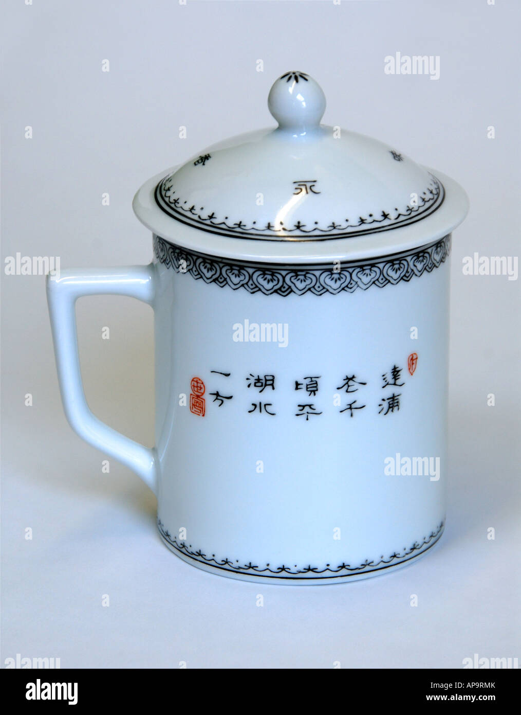 Chinese ceramic tea cup with lid, colour white with written characters ...
