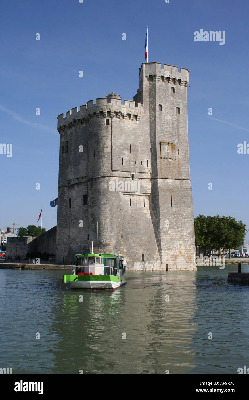 ancient stone tower guarding entrance to harbour La Rochelle harbour ...