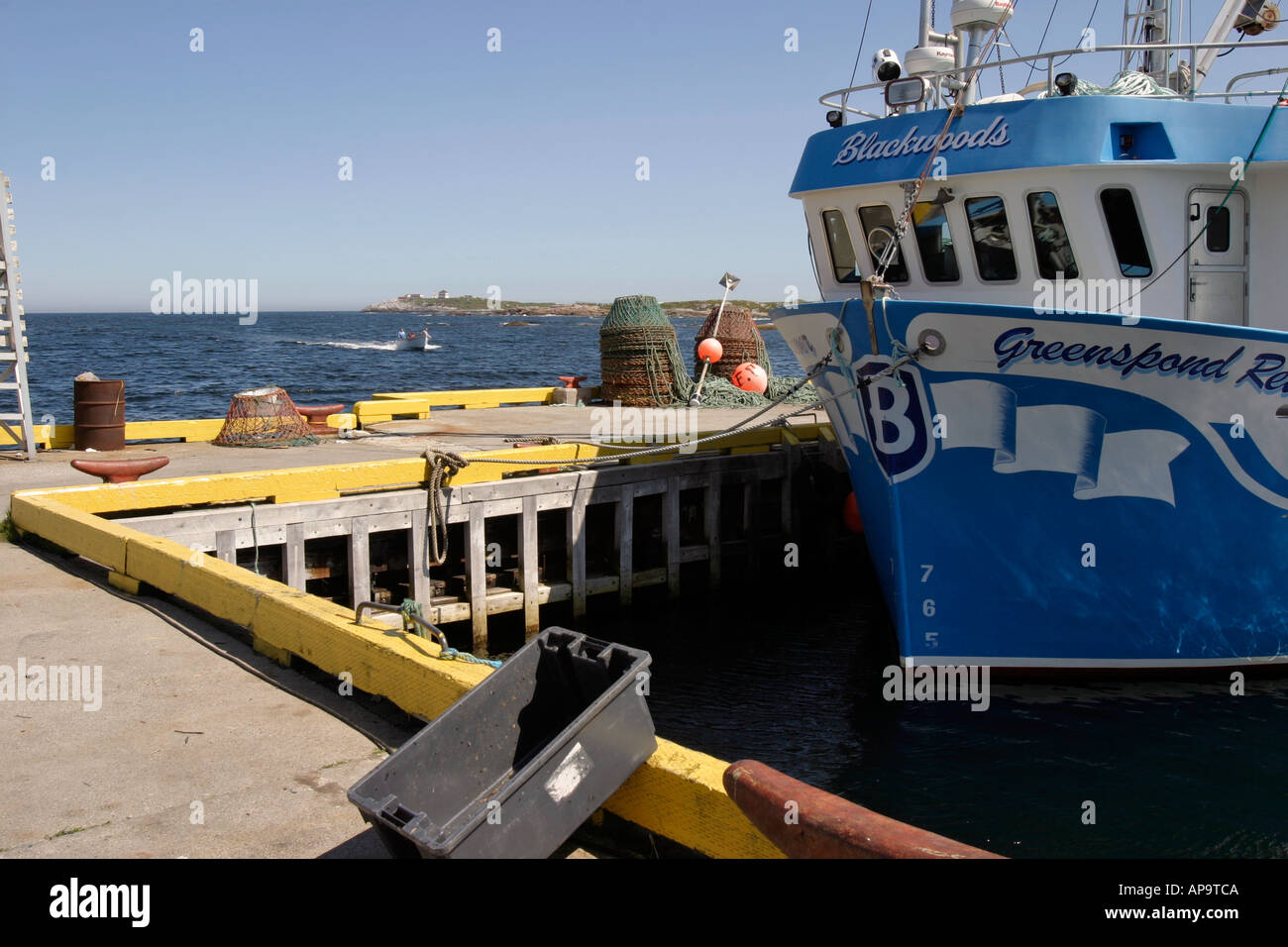 Fishing boat docked at Greenspond Harbour Newfoundland Atlantic Canada ...